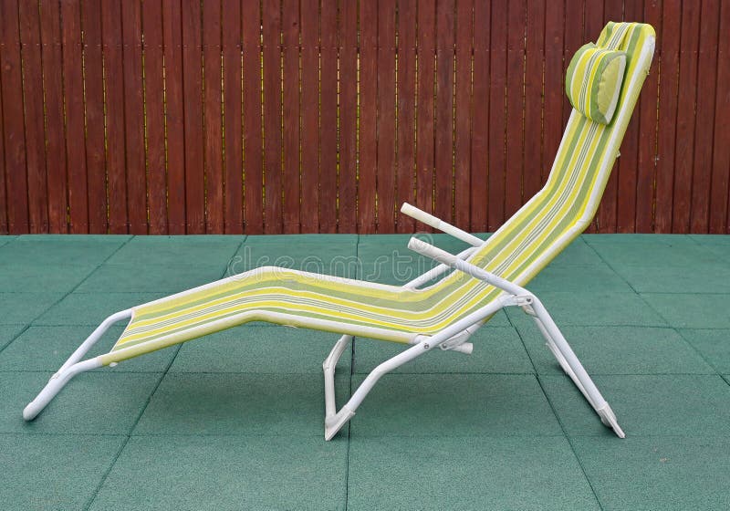 Empty Deck Chair or Chaise Longue. Concept of Recreation, Tanning in ...