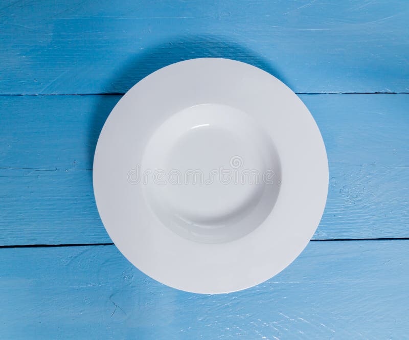 Deep Plate with Oatmeal Inside on a Lilac Background Stock Photo ...