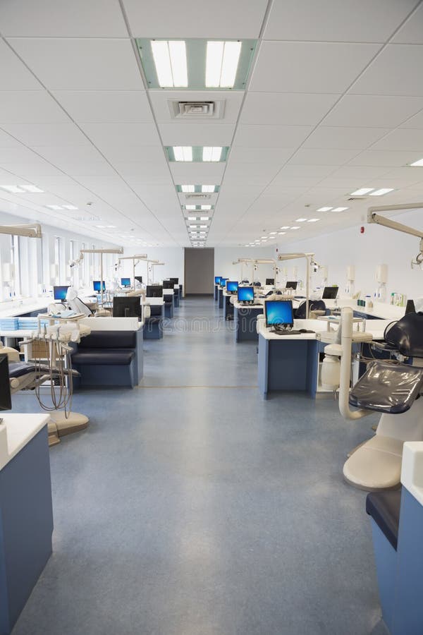 Empty Dental Clinic with Many Stations Stock Photo - Image of hospital ...