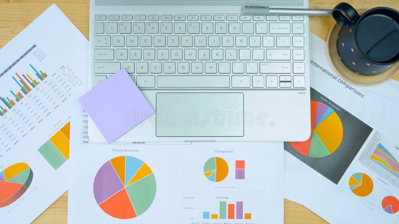 Empty Desk, Graphs and Modern Touch Screen Computer Overhead. Stock ...