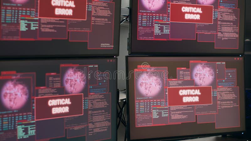 Empty Desk with Multiple Monitors Showing System Crash Warning Stock ...