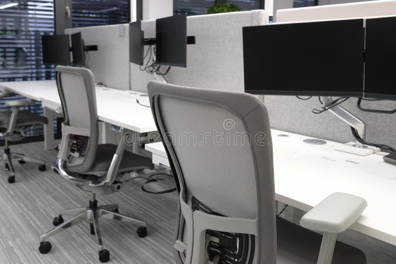 Empty Desks and Chairs in an Office Building Stock Photo - Image of ...