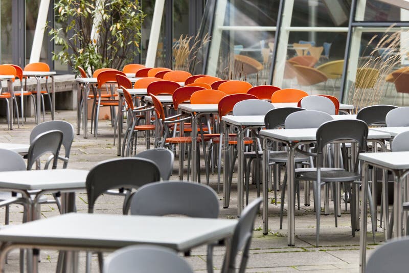 Empty Dining Tables and Chairs in a Street Cafe Stock Photo - Image of ...