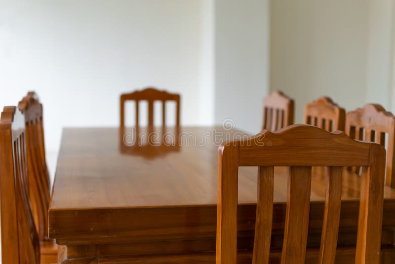 A Empty Dining Wooden Table and Chairs in the Dining Room Stock Photo ...