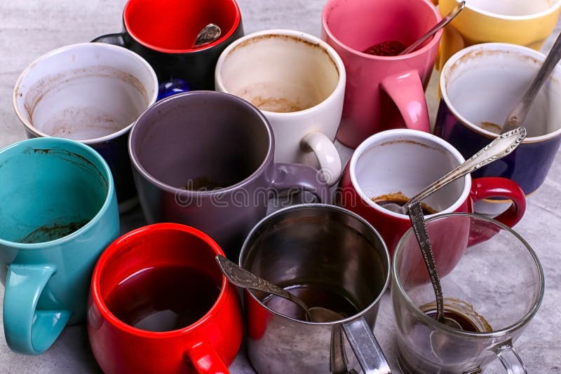 Empty Dirty Coffee Cups of Different Colors on the Table. Concept of ...