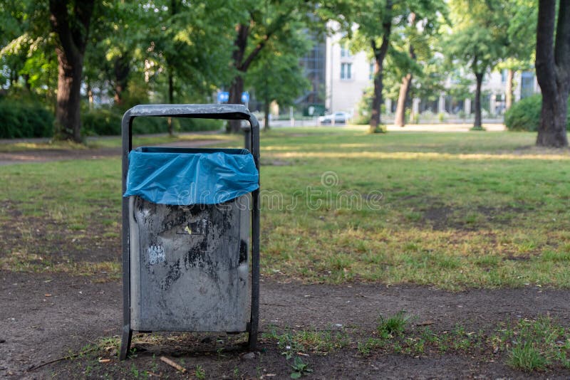 Empty and Dirty Trash Bin in a Park Stock Image - Image of plastic ...