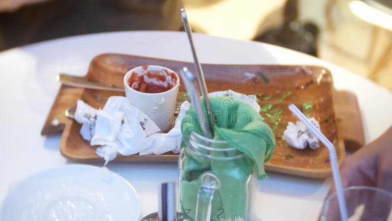 Empty Dirty Plates with Fork, Spoon and Waste Food after Eaten on Table ...