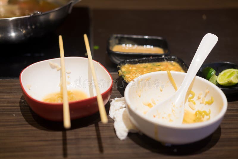 Empty Dishes after Eating on a Wooden Table Stock Image - Image of ...