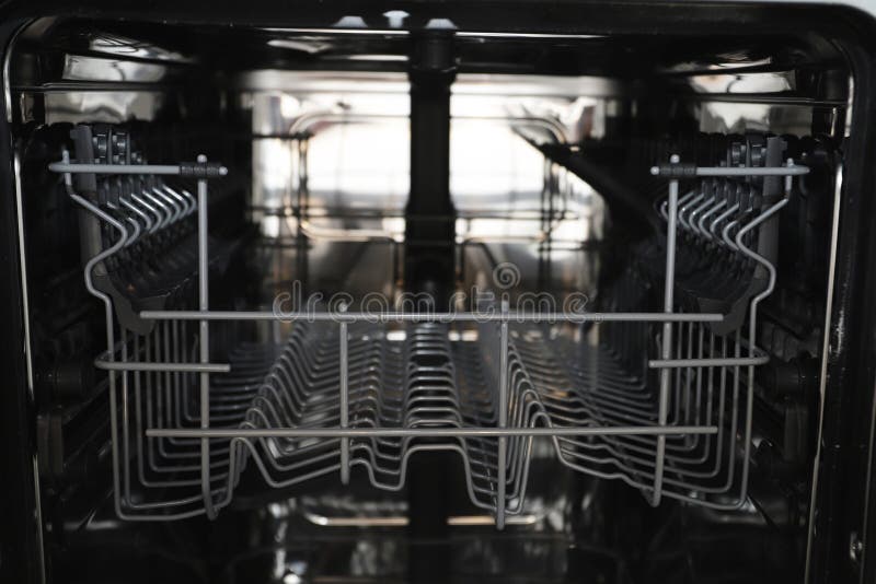 Empty dishwasher stock photo. Image of black, lunchtime - 265710406