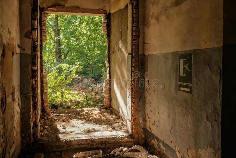 Empty Doorway in an Abandoned Brick House with Sunlight on Dilapidated ...