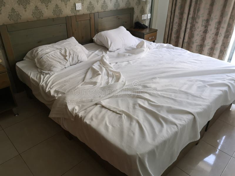Empty Double Bed and Unmade White Stock Image - Image of messy, empty ...