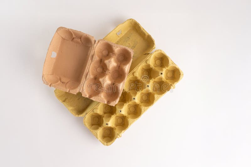 Empty Egg Cartons Stacked on a White Background, Ideal for Recycling ...