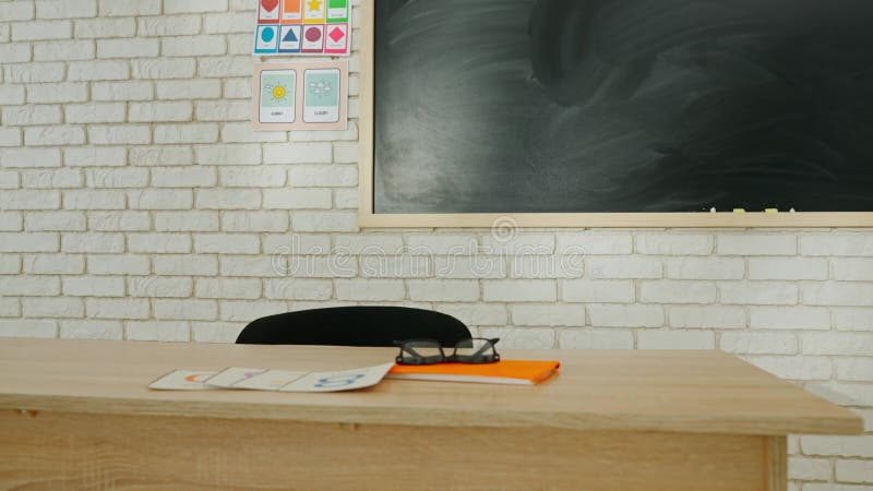Empty Elementary School Classroom with Desks, Chairs and Chalkboard ...