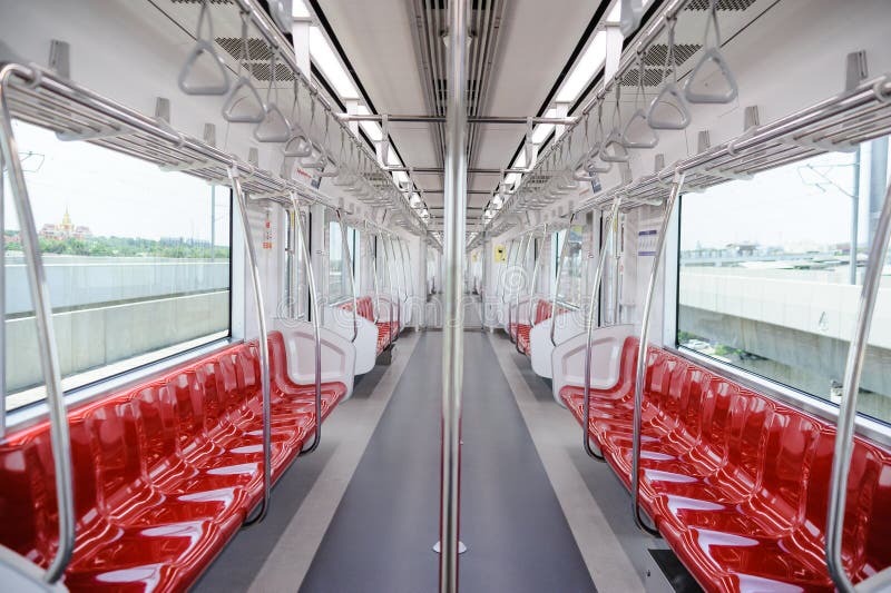 Empty Elevated Train Coach with Red Seats Stock Image - Image of ...