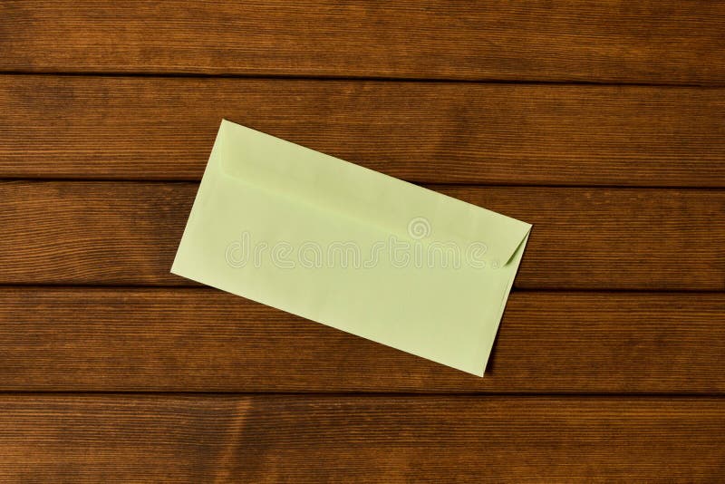 Empty Envelope on a Wooden Table. Concept of Receiving Communications ...