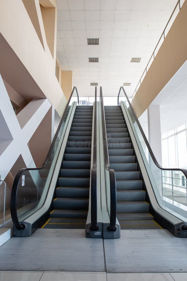 Empty escalator stairs stock photo. Image of modern - 258899084