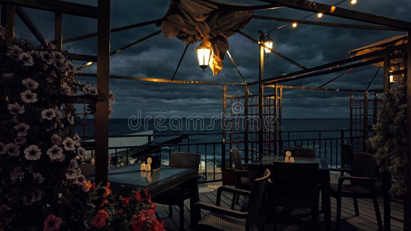 Empty Evening Cafe by the Sea, Dramatic Clouds Stock Image - Image of ...