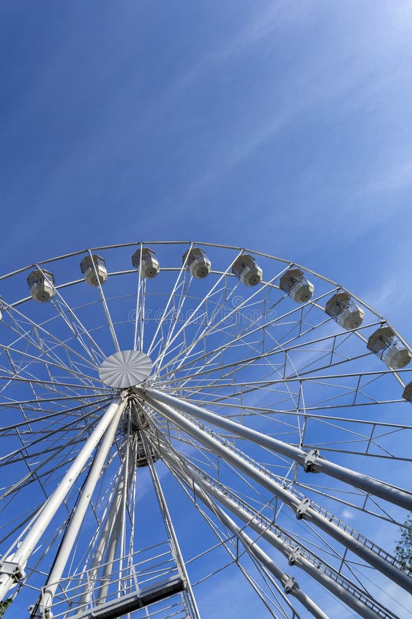 Empty Ferris Wheel with a Blue Sky in the Background Stock Image ...