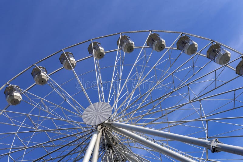 Empty Ferris Wheel with a Blue Sky in the Background Stock Photo ...