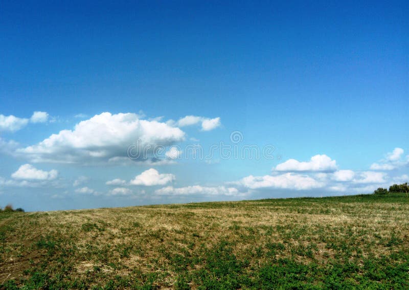 Empty field on the hill stock photo. Image of white - 229221796