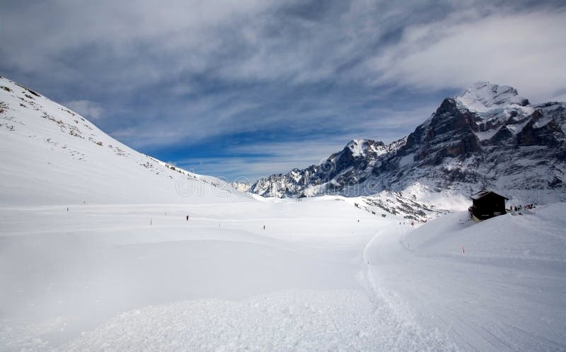 Empty Field of Snow with Small Hut Stock Photo - Image of frozen ...