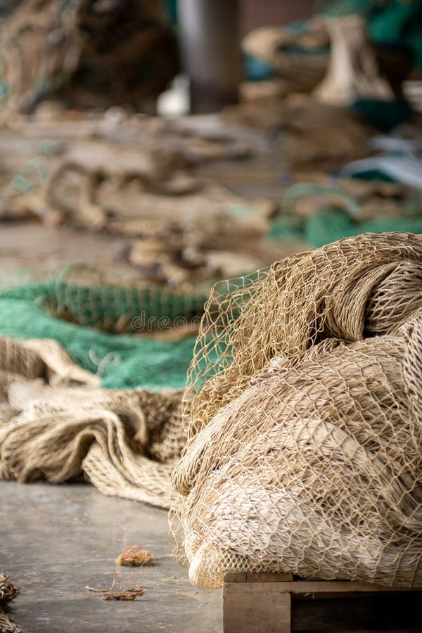 Empty Fish Nets Spread Out on the Ground at the Harbour Stock Photo ...