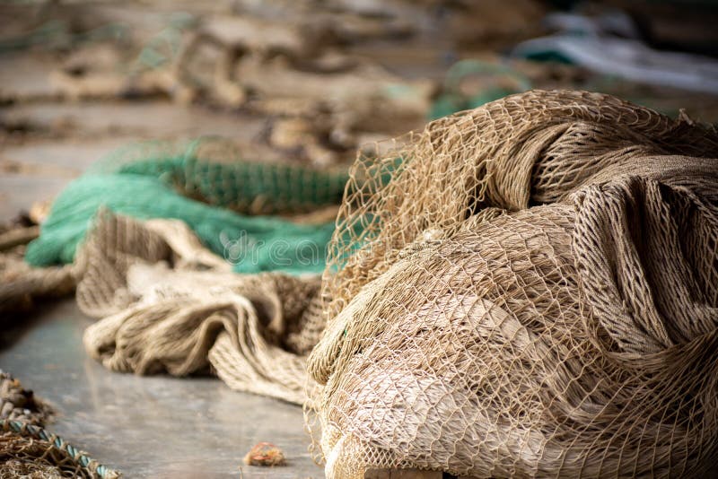 Empty Fish Nets Spread Out on the Ground at the Harbour Stock Photo ...