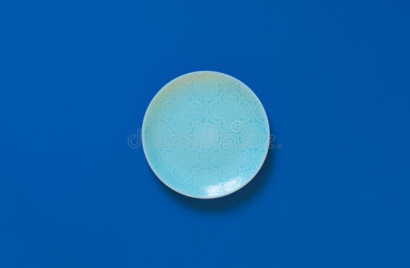 Empty Flat and Deep Plates on a Blue Background Stock Photo - Image of ...