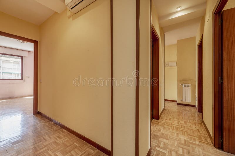 An Empty Flat with Plain Cream Walls and a Clapboard Oak Stock Photo ...