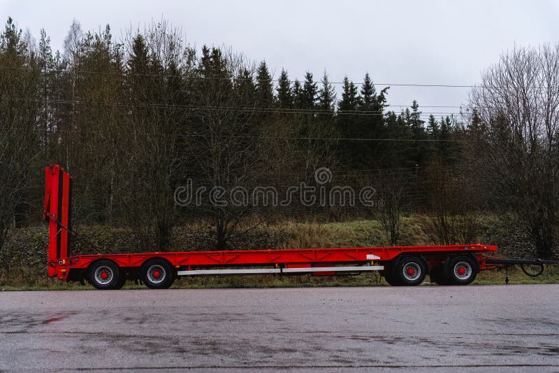 Empty Flatbed Trailer Parked on the Parking Lot Stock Photo - Image of ...