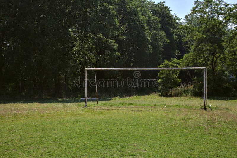 Empty Football Field with a Goal in a Park at Noon Stock Photo - Image ...