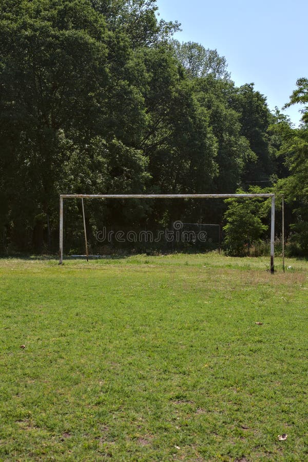 Empty Football Field with a Goal in a Park at Noon Stock Photo - Image ...