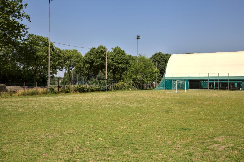 Empty Football Field with a Goal in a Park at Noon Stock Photo - Image ...