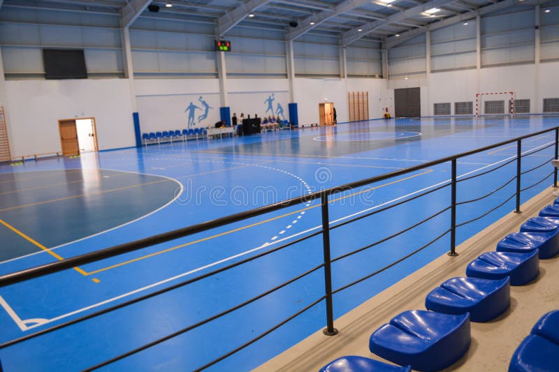 Empty Football Hall for Playing Football with Blue Surface, Seats and ...