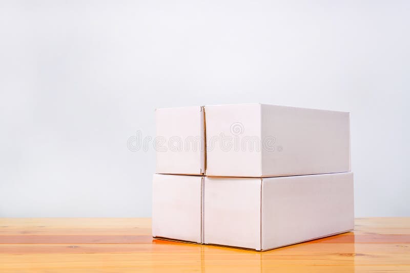 Empty Four Package White Cardboard Box for Long Items on Wooden Stock ...