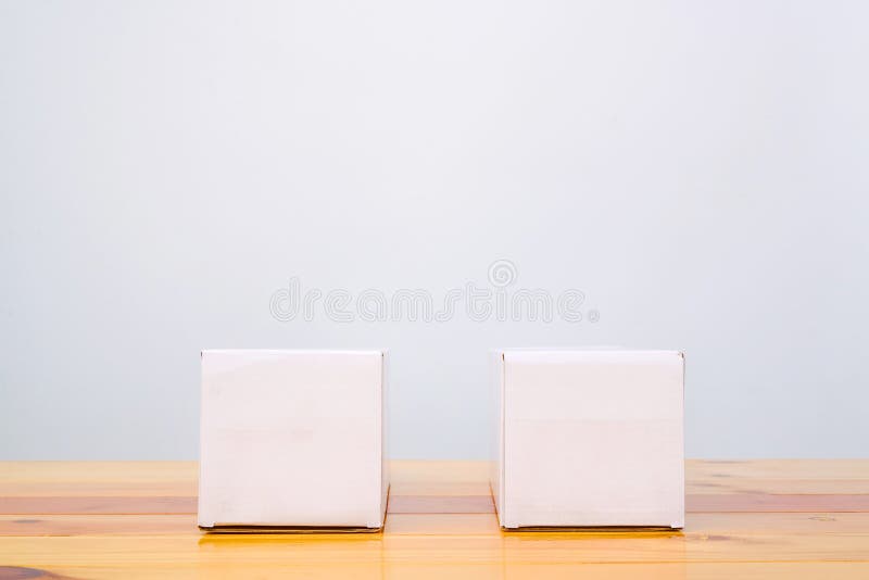 Empty Four Package White Cardboard Box for Long Items on Wooden Stock ...
