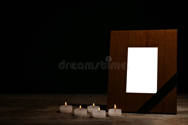 Empty Frame with Black Ribbon and Candles on Table Stock Photo - Image ...