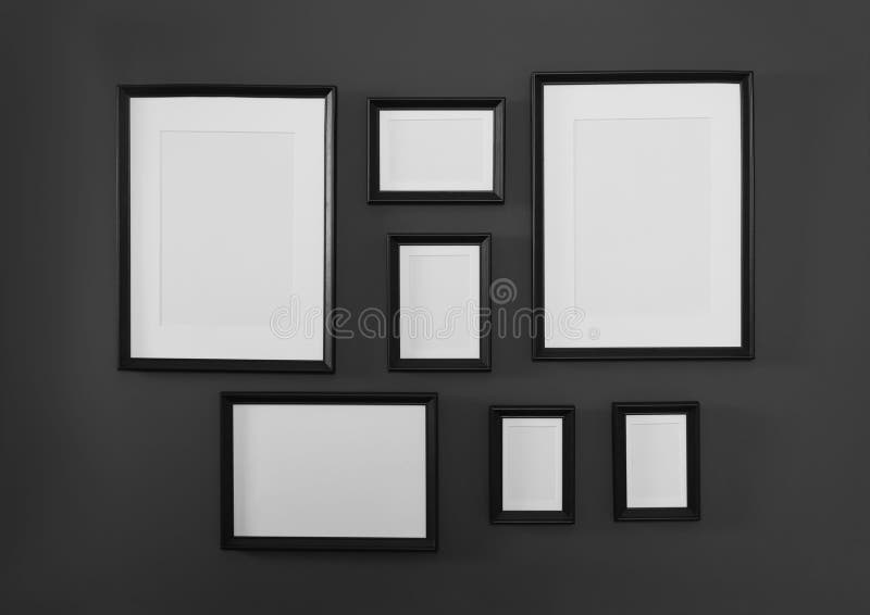 Empty Frames on Black Wall. Mockup for Design Stock Illustration ...