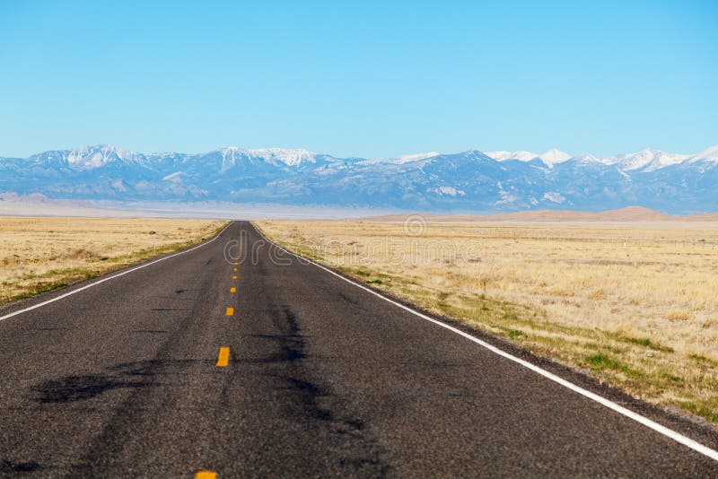 Empty Freeway Approaching Mountains Range Stock Image - Image of ...