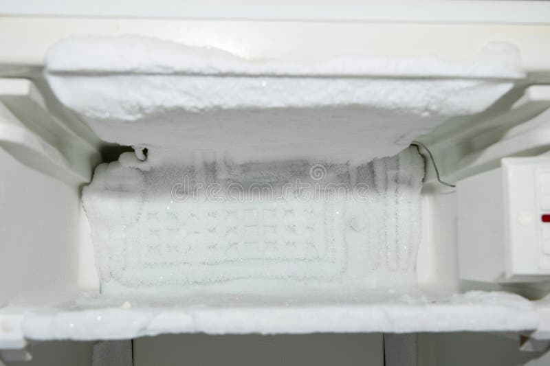 Empty Freezer Compartment of the Refrigerator, Iced Up on the Walls ...