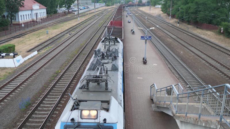 Empty Freight Train Slowly Moving Stock Photo - Image of freight, track ...