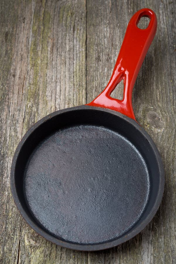 Empty Frying Pan on a Wooden Background (and Space for Text) Stock ...