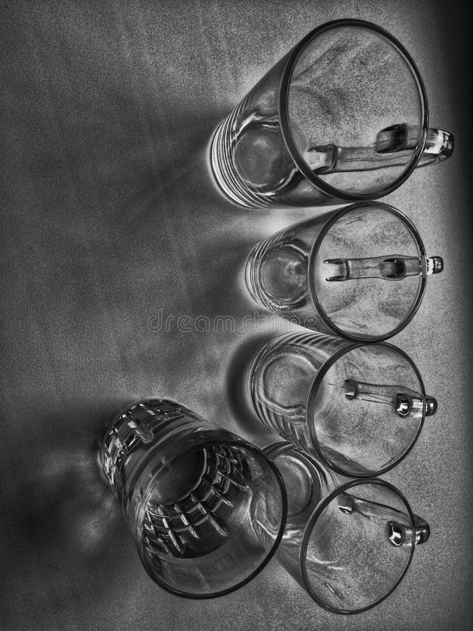 Empty and full glasses stock photo. Image of digital - 122898850