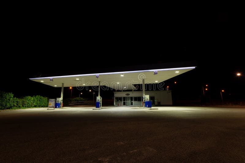 Empty gas station at night stock photo. Image of night - 154435260