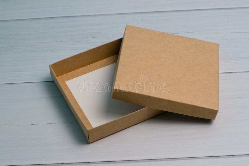Empty Gift Box on a Light Wooden Table. the Concept of a Gift for the ...