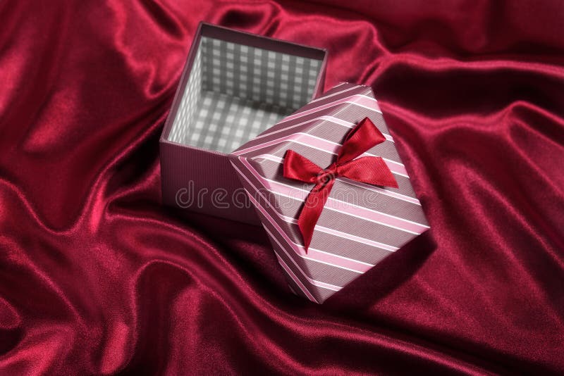 Empty Gift Box with Red Ribbon on Red Background Stock Photo - Image of ...