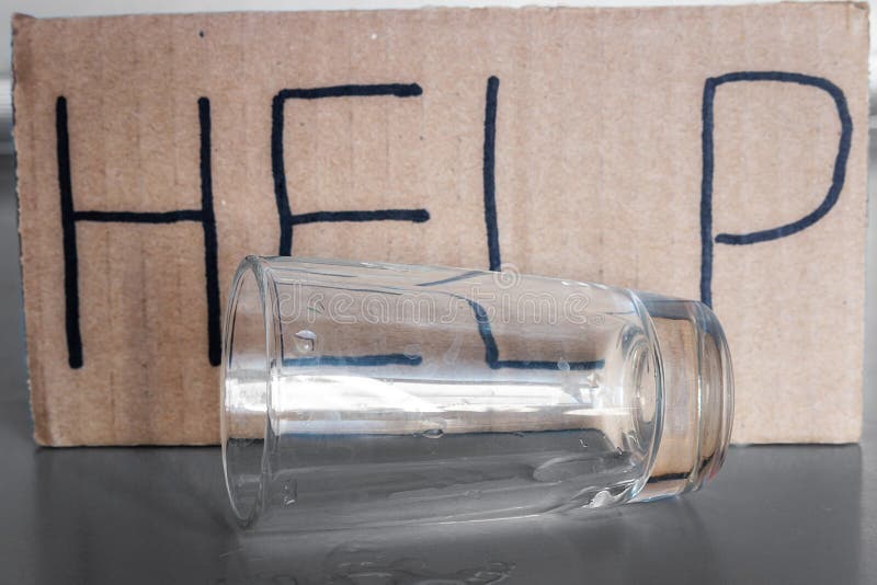 Empty Glass Against the Background of the Inscription Help the Concept ...