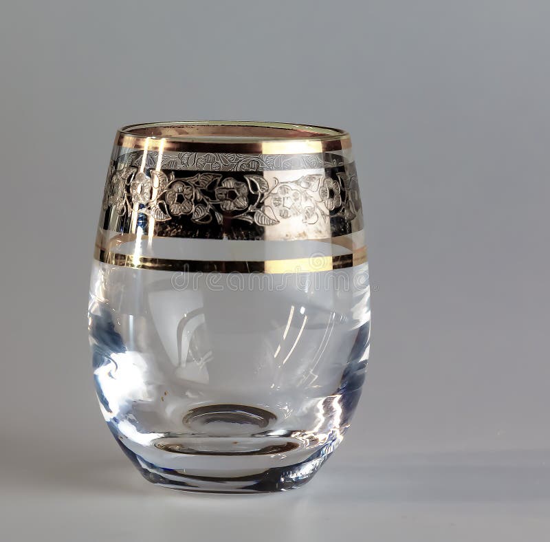 Empty Glass Bohemia Inlaid with Gold on a White Background Stock Image ...