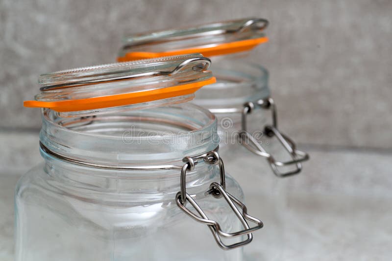 Empty Glass Bottle with Reusable Cap and Empty Fermentation Jar Stock ...