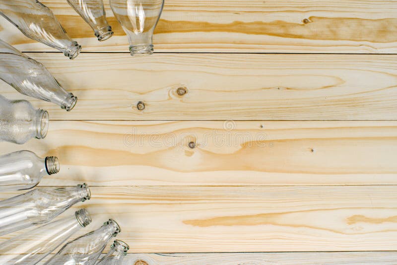 Empty Glass Bottles Lined Up in a Messy Manner on Light Brown ...